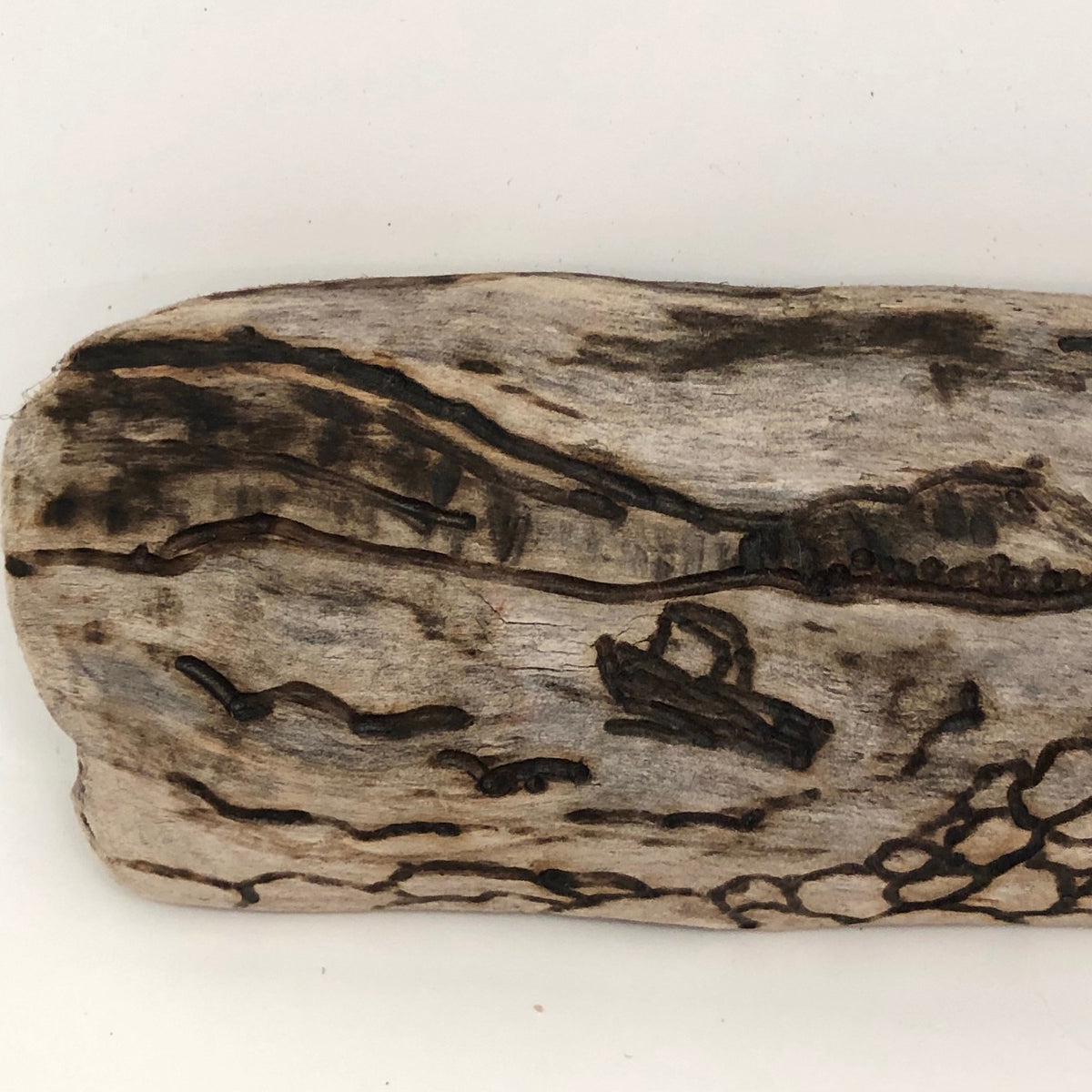 Pyrography Seascape on Driftwood with Lighthouse and Boats – critical ...